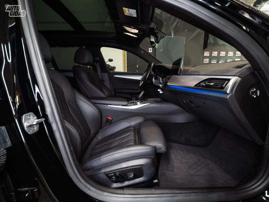 Black BMW 530 2021 in Marijampole, with an engine capacity of 3.00 L and mileage of 77 thousand km for 34950 €, photo 35 on AUTOMOTO.COM.LV