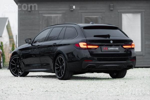 Black BMW 530 2021 in Jelgava, with an engine capacity of 2.00 L and mileage of 206 thousand km for 28900 €, photo 6 on AUTOMOTO.COM.LV