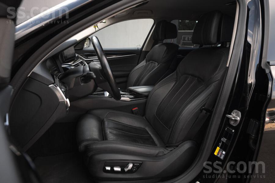 Black BMW 530 2021 in Jelgava, with an engine capacity of 2.00 L and mileage of 211 thousand km for 22000 €, photo 16 on AUTOMOTO.COM.LV