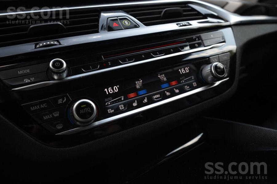 Black BMW 530 2021 in Jelgava, with an engine capacity of 2.00 L and mileage of 211 thousand km for 22000 €, photo 19 on AUTOMOTO.COM.LV