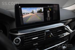 Black BMW 530 2021 in Jelgava, with an engine capacity of 2.00 L and mileage of 211 thousand km for 22000 €, photo 20 on AUTOMOTO.COM.LV