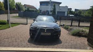 Black BMW 530 2021 in Vilnius, with an engine capacity of 2.00 L and mileage of 146 thousand km for 31299 €, photo  on AUTOMOTO.COM.LV