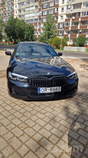 Black BMW 530 2021 in Riga, with an engine capacity of 2.00 L and mileage of 80 thousand km for 25500 €, photo 1 on AUTOMOTO.COM.LV
