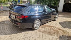 Black BMW 530 2021 in Riga, with an engine capacity of 2.00 L and mileage of 80 thousand km for 25500 €, photo 6 on AUTOMOTO.COM.LV
