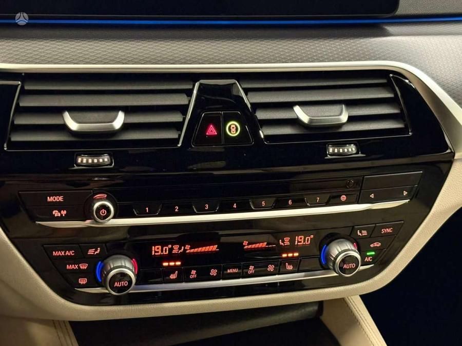 Black BMW 530 2021 in Marijampole, with an engine capacity of 2.00 L and mileage of 50 thousand km for 29999 €, photo 6 on AUTOMOTO.COM.LV