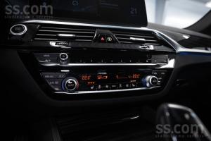 Black BMW 530 2021 in Tukums, with an engine capacity of 2.00 L and mileage of 175 thousand km for 27777 €, photo 18 on AUTOMOTO.COM.LV