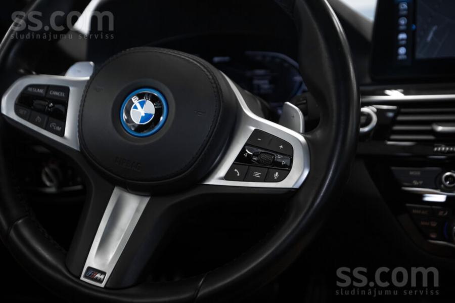 Black BMW 530 2021 in Tukums, with an engine capacity of 2.00 L and mileage of 175 thousand km for 27777 €, photo 22 on AUTOMOTO.COM.LV