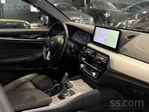 Melns BMW 530 2021 Rīga, ar dzinēja tilpumu 2.00 L un nobraukumu 80 tūkst. km par 26490 €, foto 29 vietnē AUTOMOTO.COM.LV