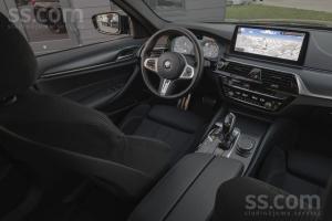 Black BMW 530 2021 in Jelgava, with an engine capacity of 2.00 L and mileage of 246 thousand km for 22500 €, photo 18 on AUTOMOTO.COM.LV