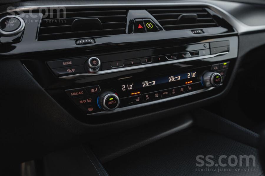 Black BMW 530 2021 in Jelgava, with an engine capacity of 2.00 L and mileage of 246 thousand km for 22500 €, photo 20 on AUTOMOTO.COM.LV
