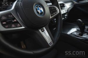 Black BMW 530 2021 in Jelgava, with an engine capacity of 2.00 L and mileage of 246 thousand km for 22500 €, photo 26 on AUTOMOTO.COM.LV