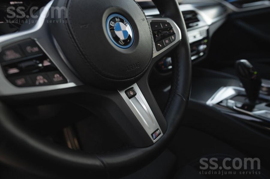 Black BMW 530 2021 in Jelgava, with an engine capacity of 2.00 L and mileage of 246 thousand km for 22500 €, photo 26 on AUTOMOTO.COM.LV
