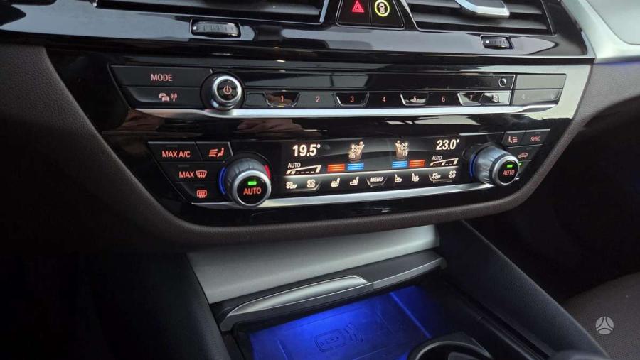 Black BMW 530 2023 in Kaunas, with an engine capacity of 2.00 L and mileage of 89 thousand km for 36600 €, photo 20 on AUTOMOTO.COM.LV