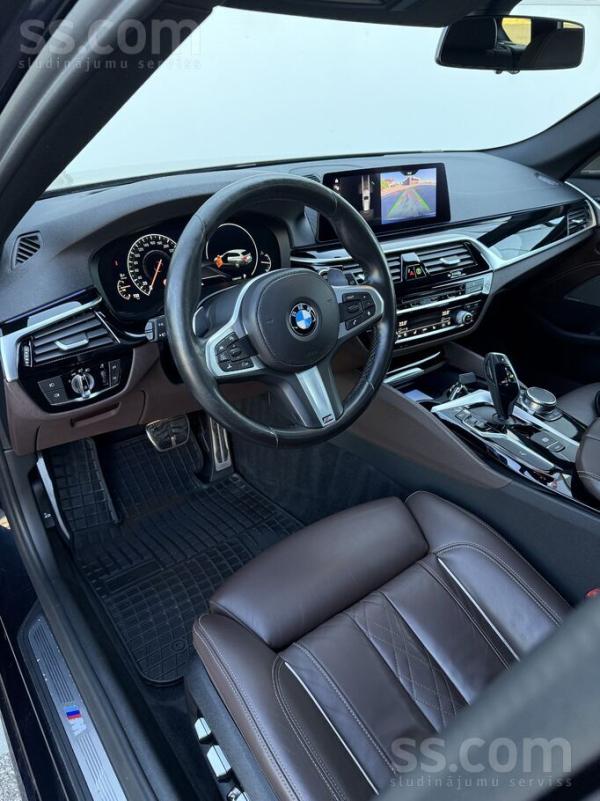 Blue BMW 530 2018 in Ogre, with an engine capacity of 3.00 L and mileage of 195 thousand km for 25900 €, photo 7 on AUTOMOTO.COM.LV