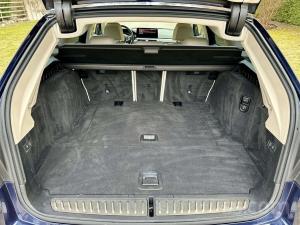 Blue BMW 530 2020 in Riga, with an engine capacity of 2.00 L and mileage of 220 thousand km for 26990 €, photo 12 on AUTOMOTO.COM.LV