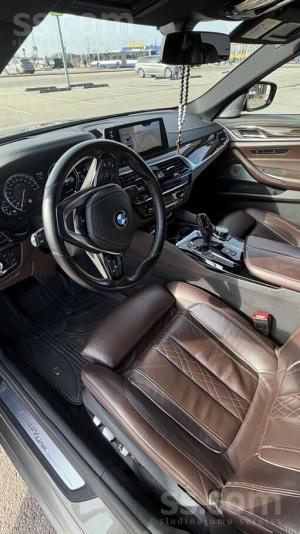 Brown BMW 530 2016 in Riga, with an engine capacity of 3.00 L and mileage of 255 thousand km for 23000 €, photo 10 on AUTOMOTO.COM.LV