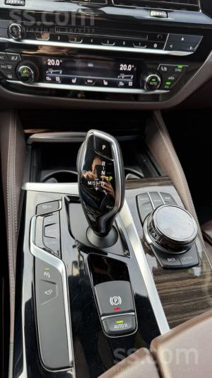 Brown BMW 530 2016 in Riga, with an engine capacity of 3.00 L and mileage of 255 thousand km for 23000 €, photo 16 on AUTOMOTO.COM.LV