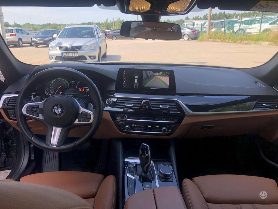 Brown BMW 530 2018 in Utena, with an engine capacity of 2.99 L and mileage of 221 thousand km for 17350 €, photo 14 on AUTOMOTO.COM.LV