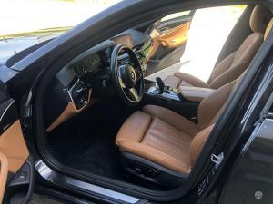 Brown BMW 530 2018 in Utena, with an engine capacity of 2.99 L and mileage of 221 thousand km for 17350 €, photo 17 on AUTOMOTO.COM.LV
