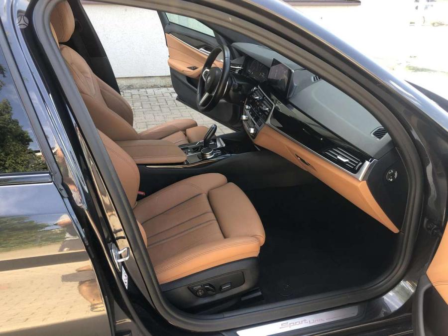 Brown BMW 530 2018 in Utena, with an engine capacity of 2.99 L and mileage of 221 thousand km for 17350 €, photo 21 on AUTOMOTO.COM.LV