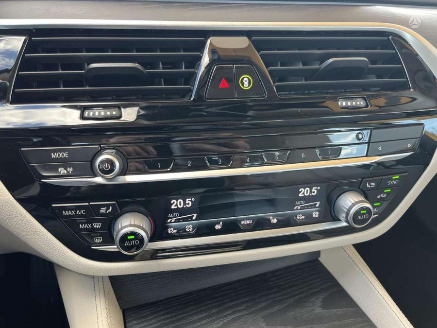 Grey BMW 530 2021 in Vilnius, with an engine capacity of 2.00 L and mileage of 142 thousand km for 30999 €, photo 19 on AUTOMOTO.COM.LV
