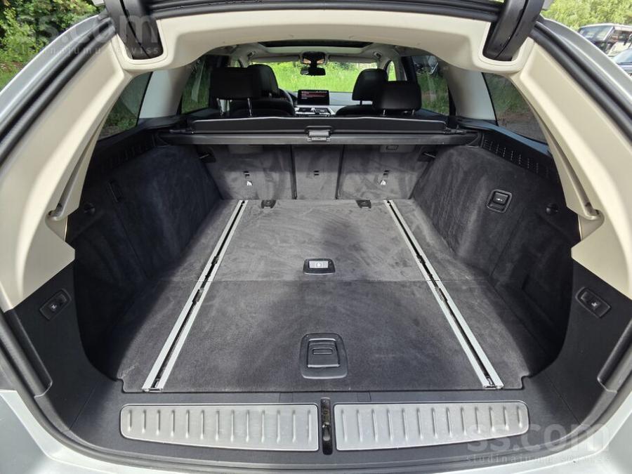 Grey BMW 530 2021 in Riga, with an engine capacity of 3.00 L and mileage of 229 thousand km for 21790 €, photo 11 on AUTOMOTO.COM.LV