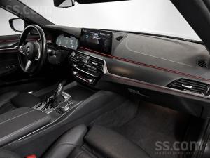 Grey BMW 530 2021 in Riga, with an engine capacity of 2.00 L and mileage of 163 thousand km for 32900 €, photo 11 on AUTOMOTO.COM.LV