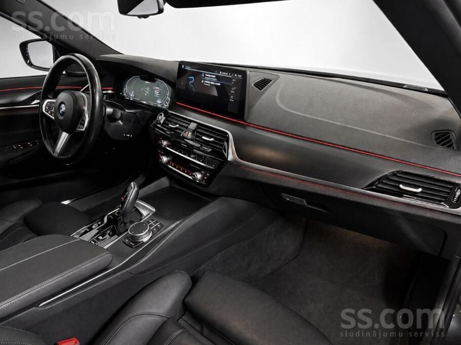 Grey BMW 530 2021 in Riga, with an engine capacity of 2.00 L and mileage of 163 thousand km for 32900 €, photo 11 on AUTOMOTO.COM.LV