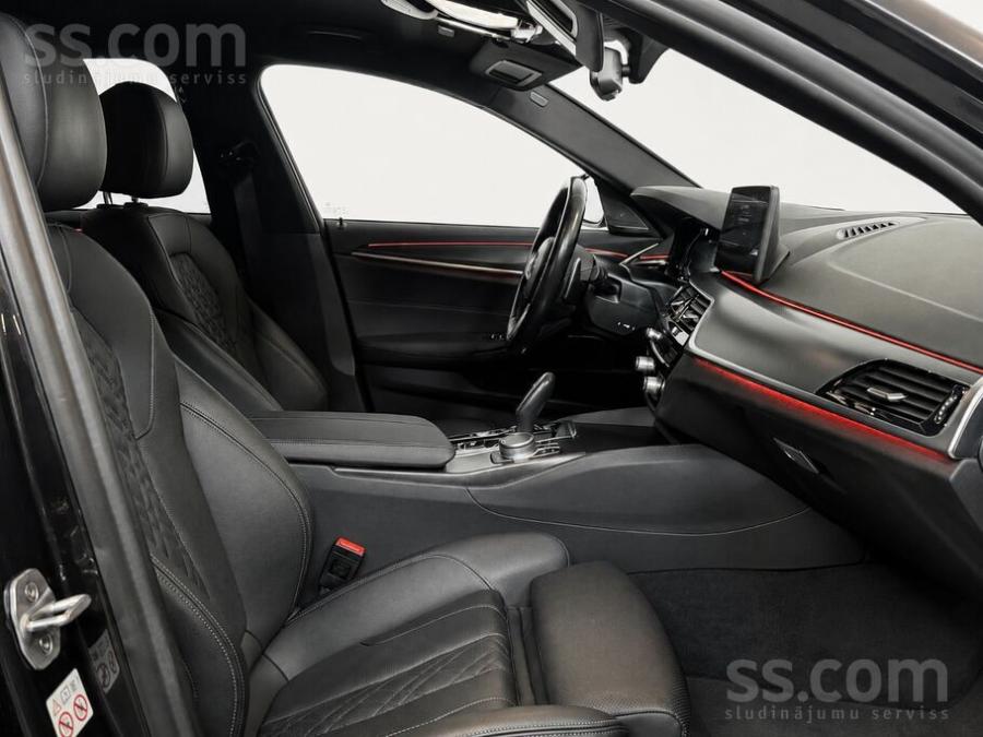 Grey BMW 530 2021 in Riga, with an engine capacity of 2.00 L and mileage of 163 thousand km for 32900 €, photo 12 on AUTOMOTO.COM.LV
