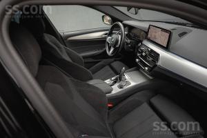 Grey BMW 530 2021 in Jelgava, with an engine capacity of 2.00 L and mileage of 170 thousand km for 24000 €, photo 12 on AUTOMOTO.COM.LV
