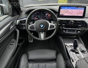 Grey BMW 530 2022 in Talsi, with an engine capacity of 3.00 L and mileage of 199 thousand km for 33999 €, photo 10 on AUTOMOTO.COM.LV