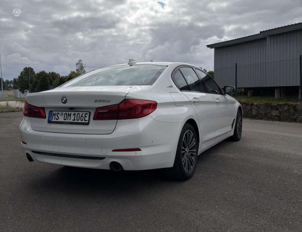 White BMW 530 2019 in Plunge, with an engine capacity of 2.00 L and mileage of 112 thousand km for 18800 €, photo 5 on AUTOMOTO.COM.LV