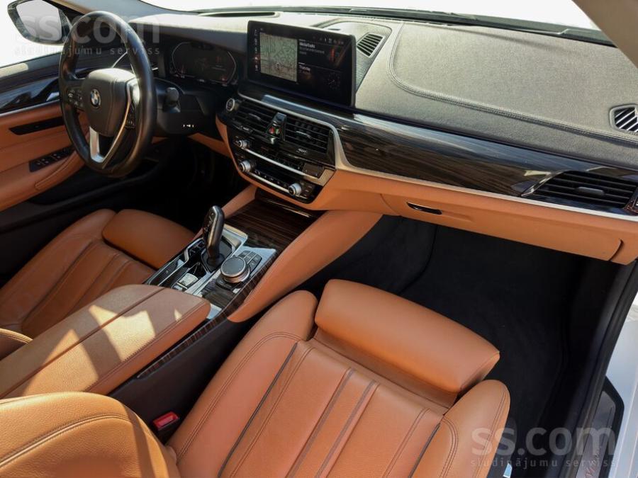 White BMW 530 2021 in Riga, with an engine capacity of 3.00 L and mileage of 83 thousand km for 35900 €, photo 6 on AUTOMOTO.COM.LV