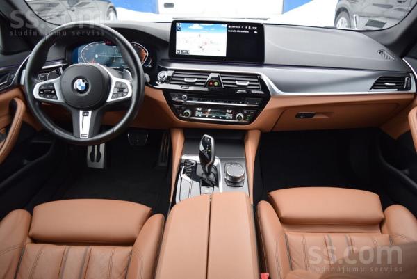 White BMW 530 2023 in Riga, with an engine capacity of 3.00 L and mileage of 92 thousand km for 39900 €, photo 4 on AUTOMOTO.COM.LV