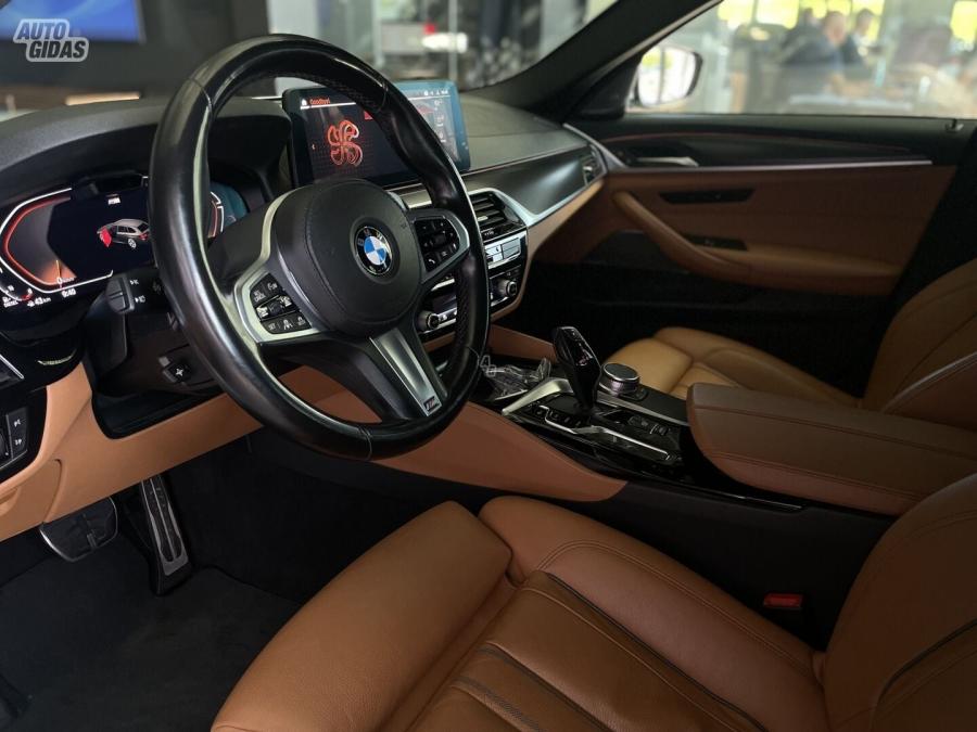 White BMW 530 2021 in Klaipeda, with an engine capacity of 3.00 L and mileage of 180 thousand km for 31881 €, photo 12 on AUTOMOTO.COM.LV