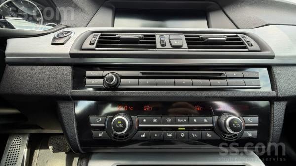 Black BMW 535 2011 in Riga, with an engine capacity of 3.00 L and mileage of 318 thousand km for 10900 €, photo 5 on AUTOMOTO.COM.LV
