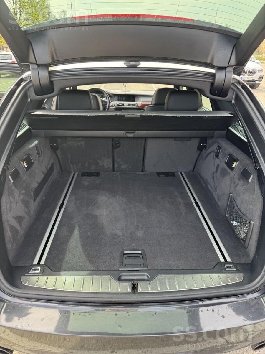 Black BMW 535 2012 in Riga, with an engine capacity of 3.00 L and mileage of 300 thousand km for 11590 €, photo 14 on AUTOMOTO.COM.LV