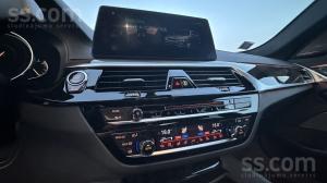 Black BMW 540 2017 in Riga, with an engine capacity of 3.00 L and mileage of 130 thousand km for 33500 €, photo 9 on AUTOMOTO.COM.LV