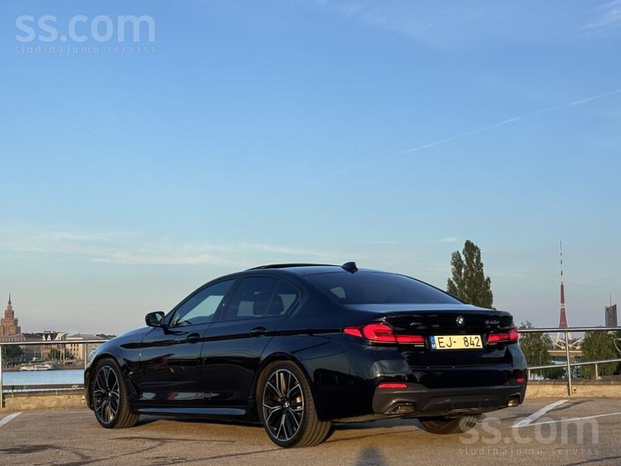 Black BMW 540 2022 in Riga, with an engine capacity of 3.00 L and mileage of 153 thousand km for 45500 €, photo 7 on AUTOMOTO.COM.LV