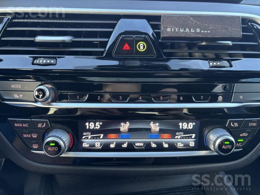 Black BMW 540 2022 in Riga, with an engine capacity of 3.00 L and mileage of 153 thousand km for 45500 €, photo 12 on AUTOMOTO.COM.LV