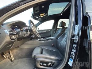 Black BMW 540 2022 in Riga, with an engine capacity of 3.00 L and mileage of 153 thousand km for 45500 €, photo 14 on AUTOMOTO.COM.LV