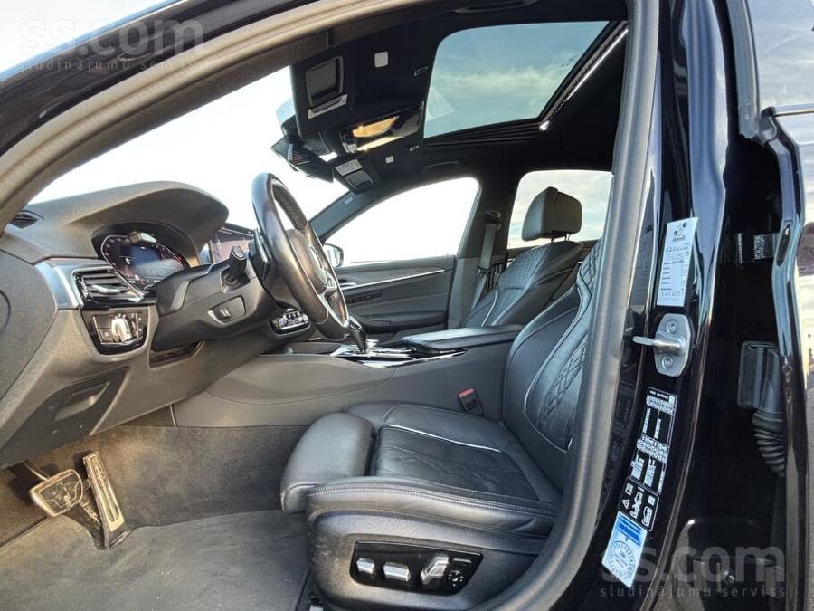 Black BMW 540 2022 in Riga, with an engine capacity of 3.00 L and mileage of 153 thousand km for 45500 €, photo 14 on AUTOMOTO.COM.LV