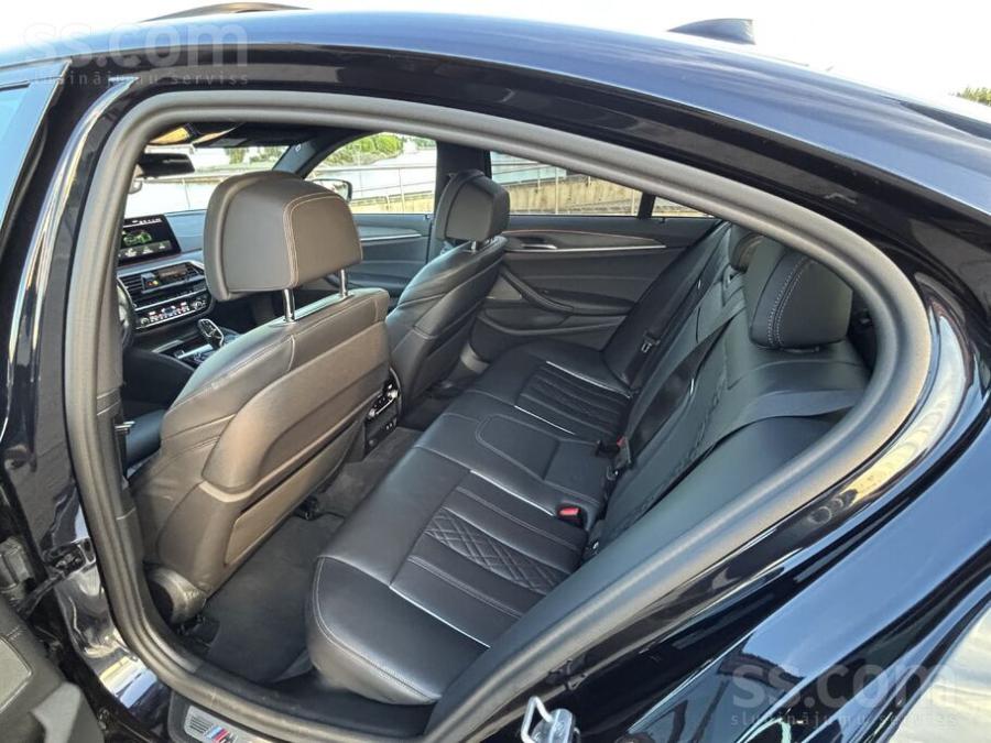 Black BMW 540 2022 in Riga, with an engine capacity of 3.00 L and mileage of 153 thousand km for 45500 €, photo 15 on AUTOMOTO.COM.LV
