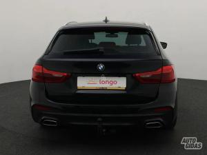 Black BMW 540 2018 in Vilnius, with an engine capacity of 3.00 L and mileage of 242 thousand km for 22699 €, photo 6 on AUTOMOTO.COM.LV