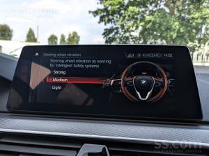 Black BMW 540 2018 in Tukums, with an engine capacity of 3.00 L and mileage of 209 thousand km for 25990 €, photo 15 on AUTOMOTO.COM.LV