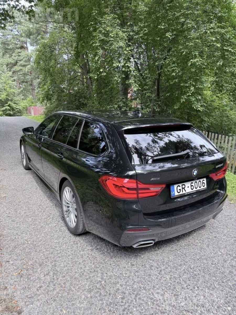 Black BMW 540 2019 in Riga, with an engine capacity of 3.00 L and mileage of 239 thousand km for 22500 €, photo 7 on AUTOMOTO.COM.LV