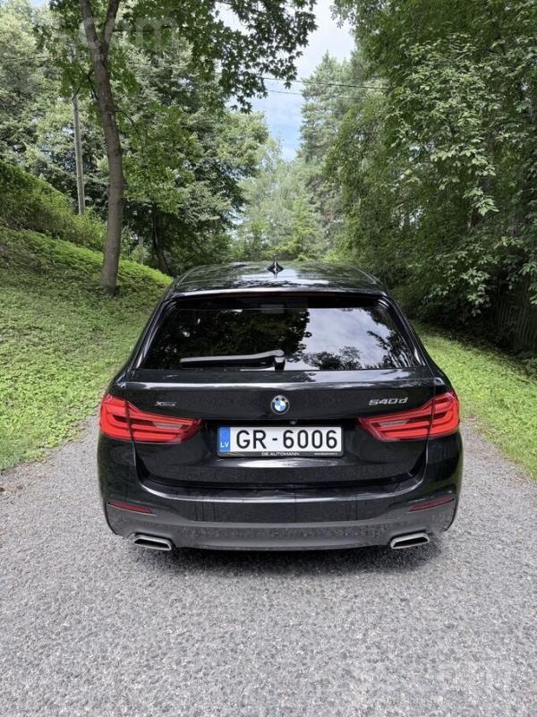 Black BMW 540 2019 in Riga, with an engine capacity of 3.00 L and mileage of 239 thousand km for 22500 €, photo 8 on AUTOMOTO.COM.LV