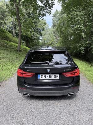 Black BMW 540 2019 in Riga, with an engine capacity of 3.00 L and mileage of 239 thousand km for 22500 €, photo 9 on AUTOMOTO.COM.LV
