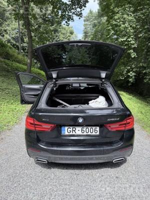 Black BMW 540 2019 in Riga, with an engine capacity of 3.00 L and mileage of 239 thousand km for 22500 €, photo 10 on AUTOMOTO.COM.LV