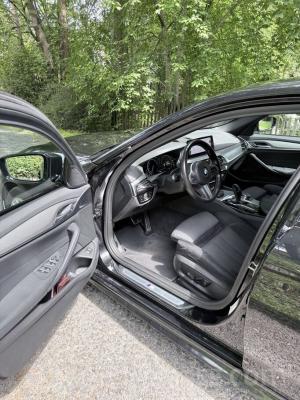 Black BMW 540 2019 in Riga, with an engine capacity of 3.00 L and mileage of 239 thousand km for 22500 €, photo 14 on AUTOMOTO.COM.LV